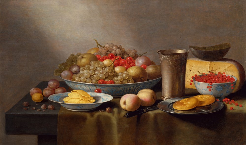 Natura morta con frutta, formaggio, pane e un calice